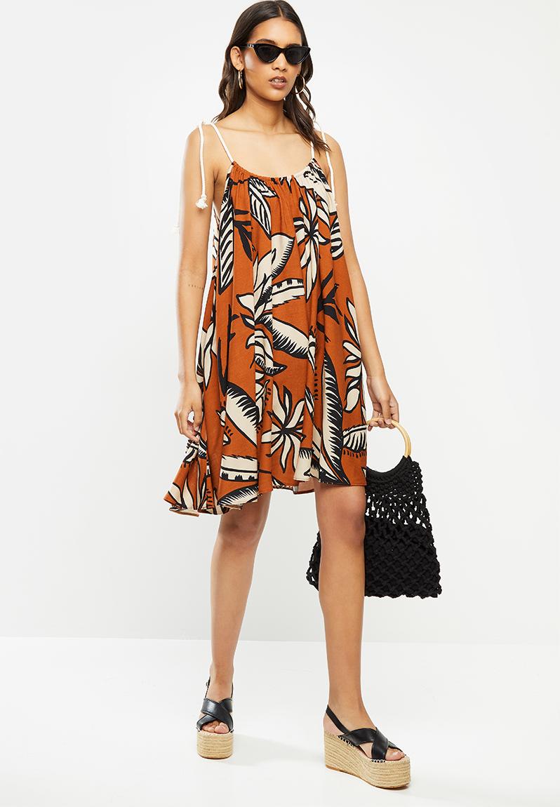 Tropical printed trapeze mini dress with rope tunneled neckline-rust ...