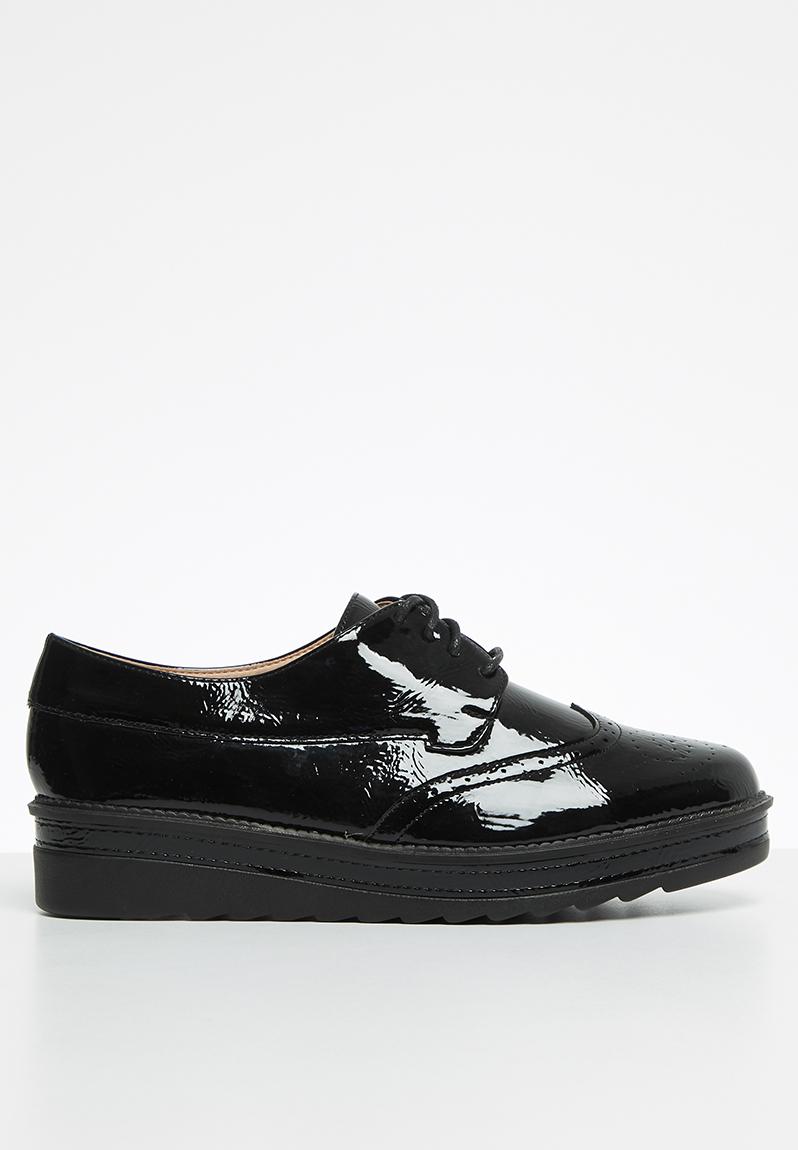 Patched flatform brogue - black crush patent Seduction Pumps & Flats ...