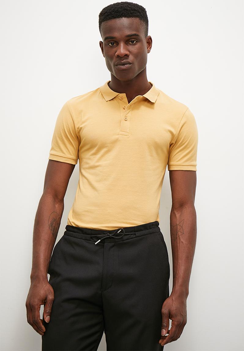 Plain muscle fit golfer - stone