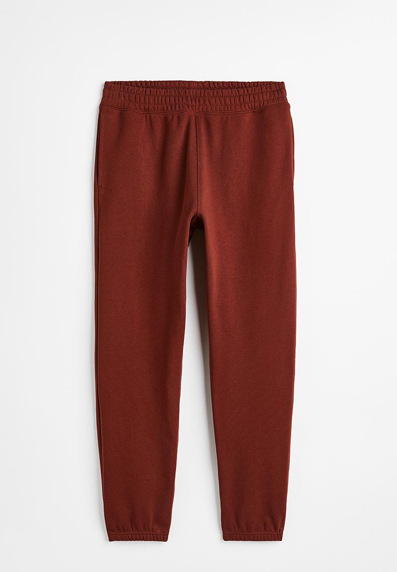 Relaxed fit cotton joggers - rust red - 1035205012 H&M Pants & Chinos ...
