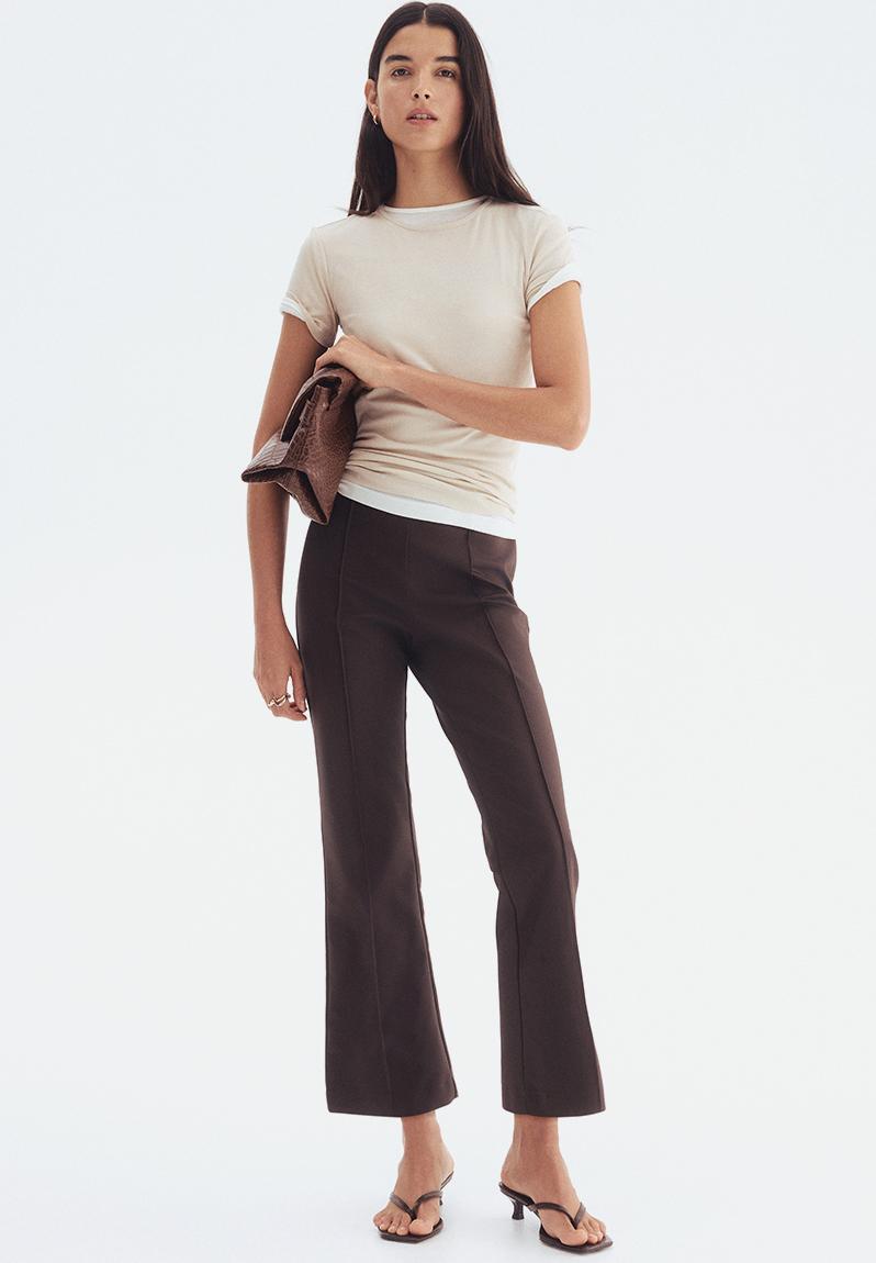 Flared crease-front trousers - dark brown - 1290468008
